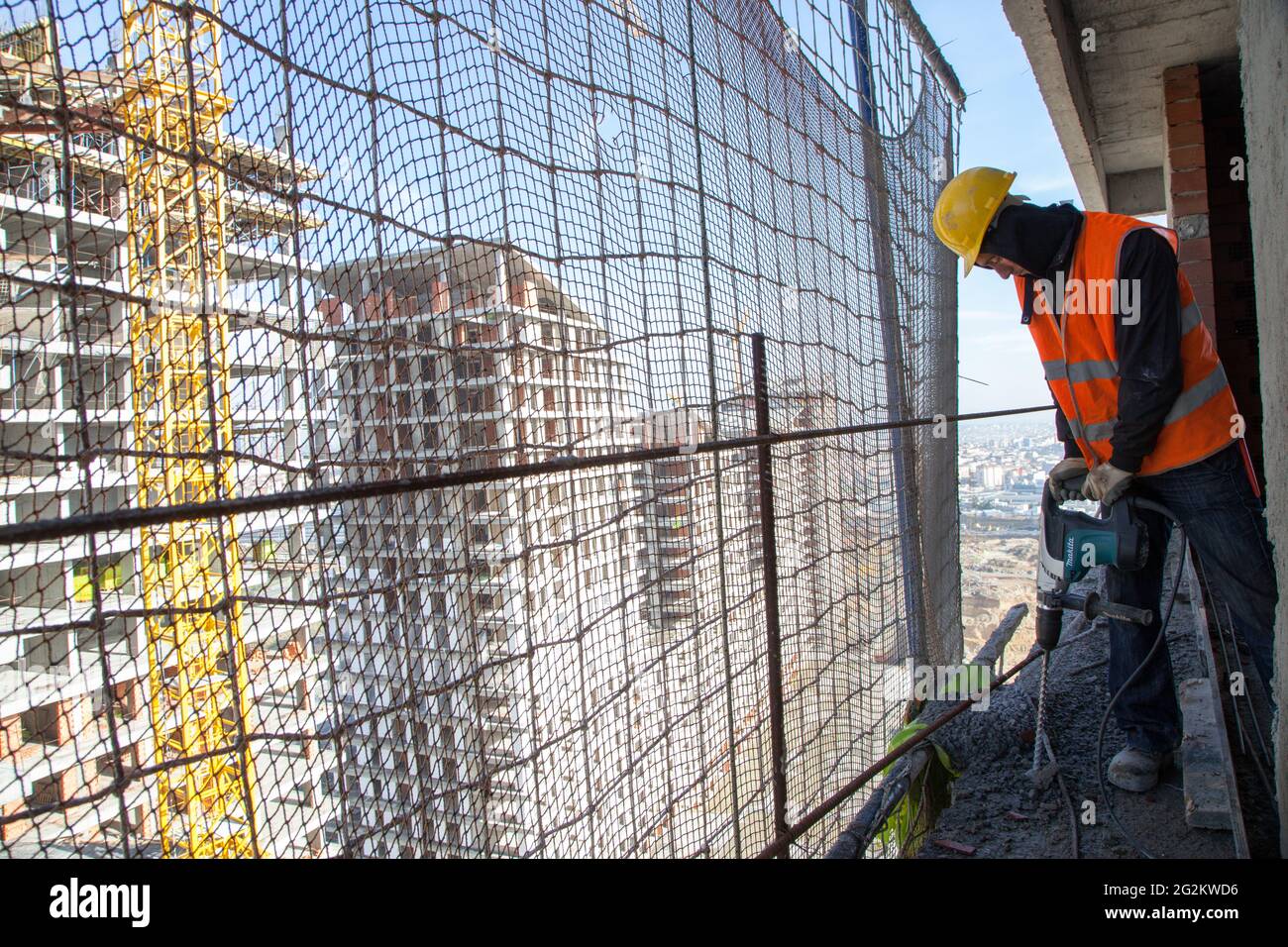 Istanbul,Turkey - 02-01-2013:Workers working on the high apartment ...
