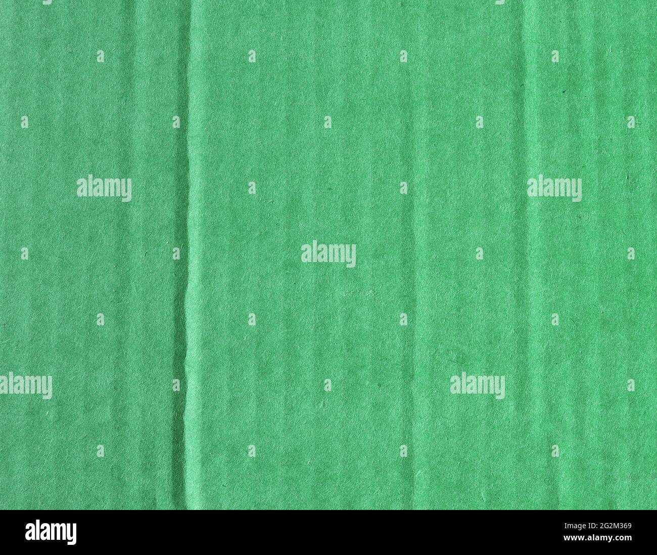 green cardboard texture useful as a background Stock Photo - Alamy