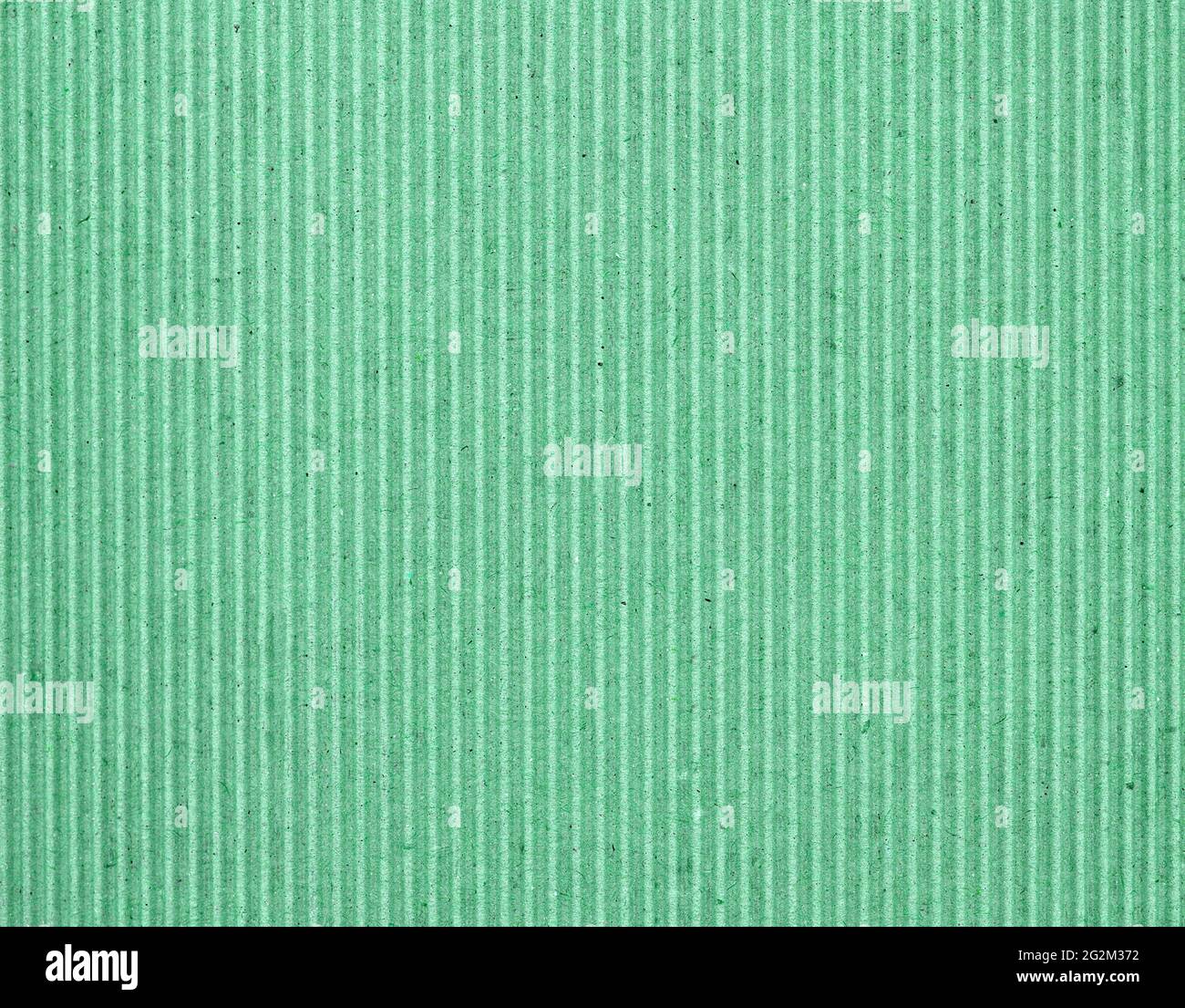 green cardboard texture useful as a background Stock Photo - Alamy