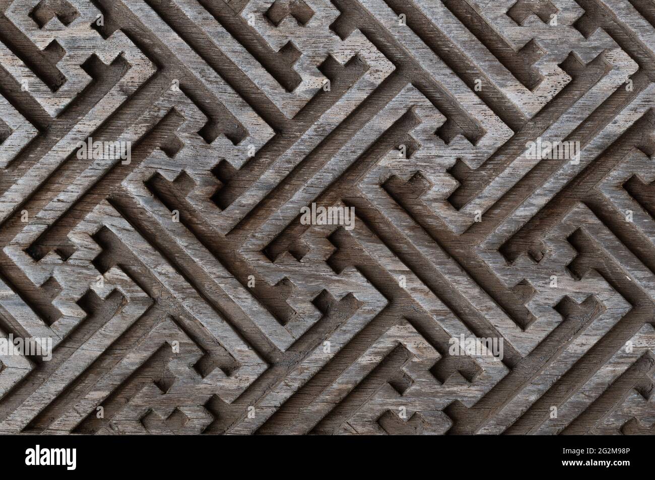 Balinese wood carving background. Graphic angular patterns on the doors ...