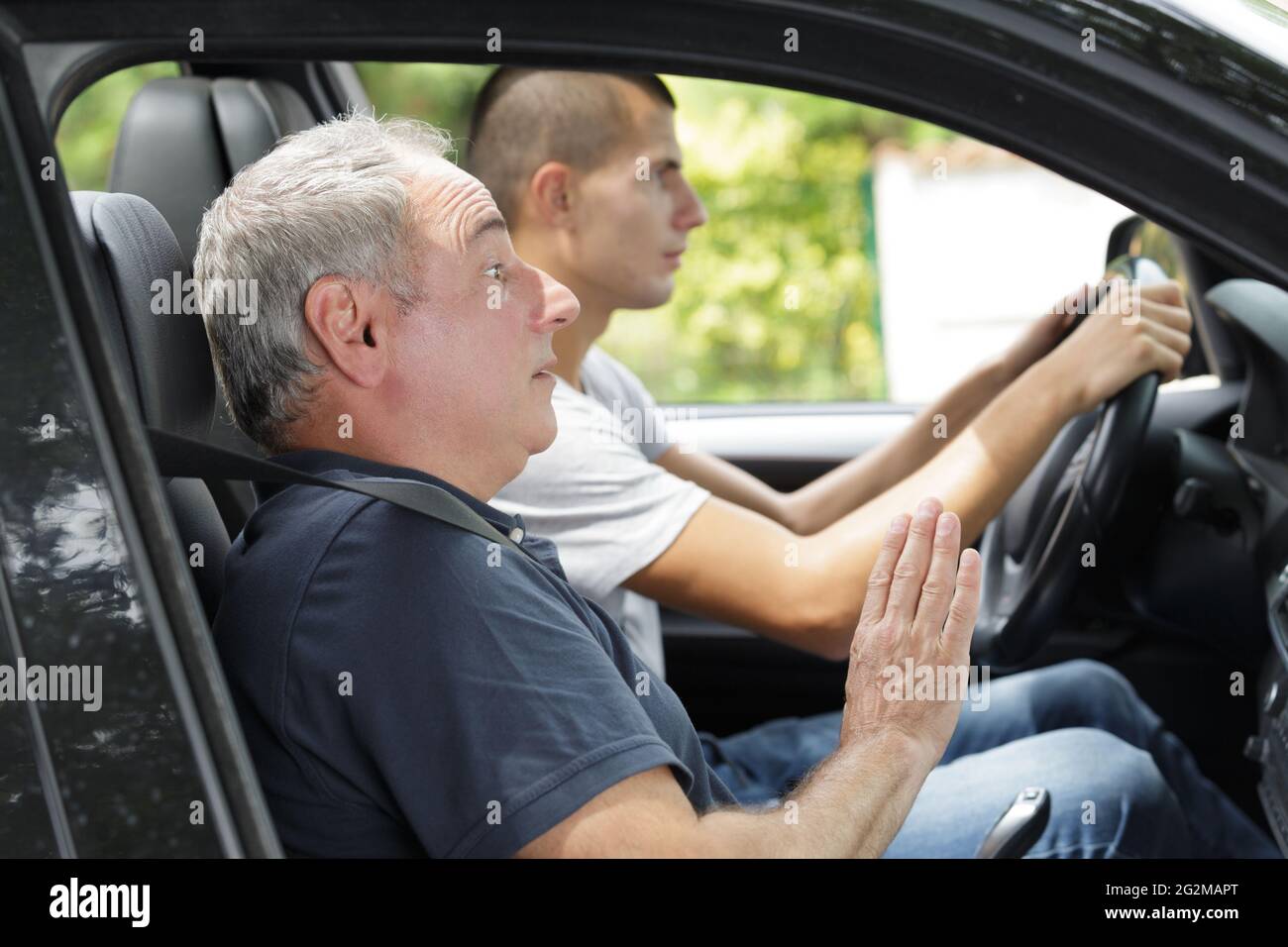 young man passing driving license exam Stock Photo - Alamy