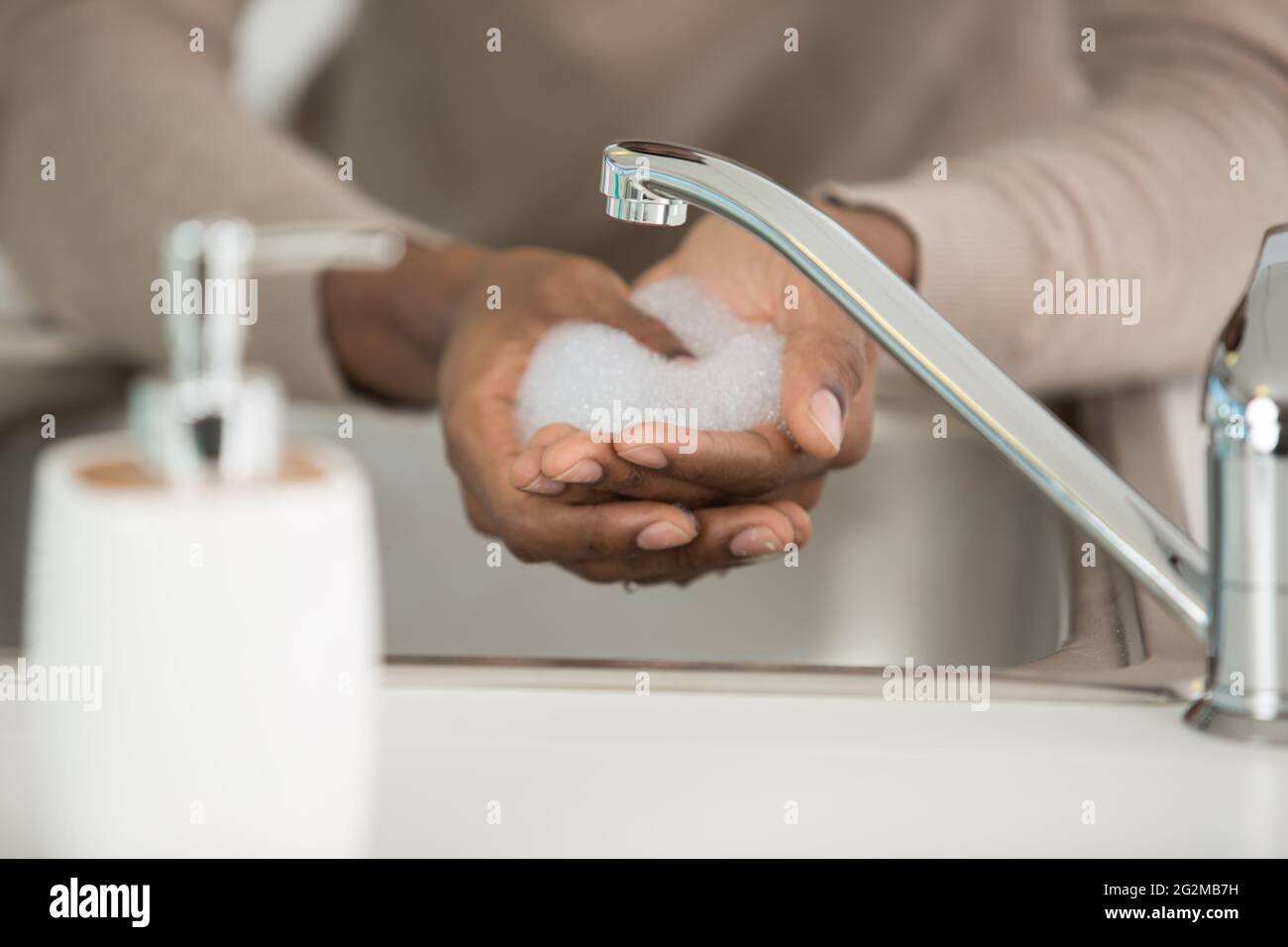 Handwashing in sink hi-res stock photography and images - Alamy