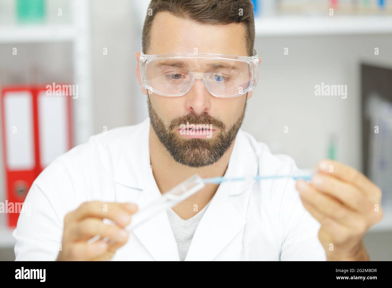 man with test tubes in a chemistry Stock Photo - Alamy
