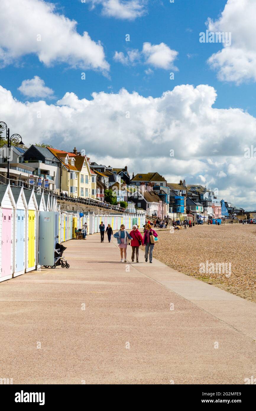 Colourful pastel coloured beach huts on the sea front in Lyme Regis on ...