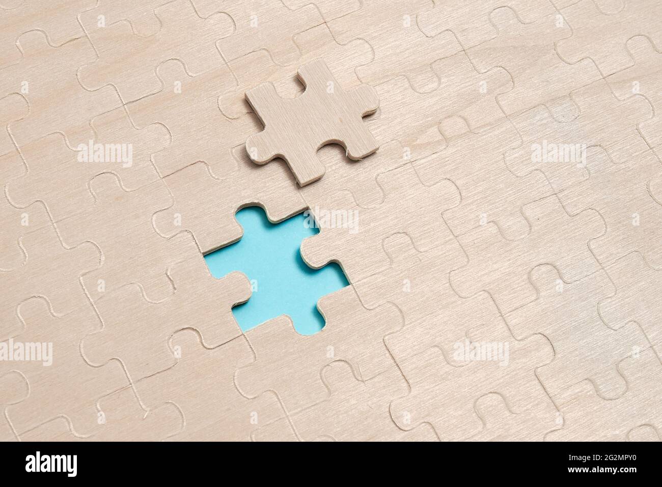 Building An Unfinished White Jigsaw Pattern Puzzle With Missing Last ...