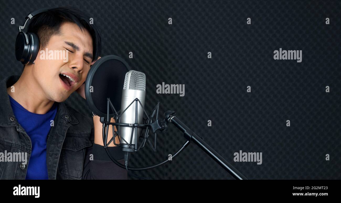 Asian man singing in karaoke hi-res stock photography and images - Alamy