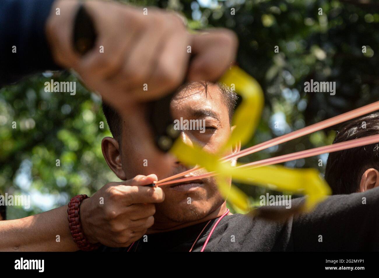 Jakarta, Indonesia. 12th June, 2021. A man participates in a ...