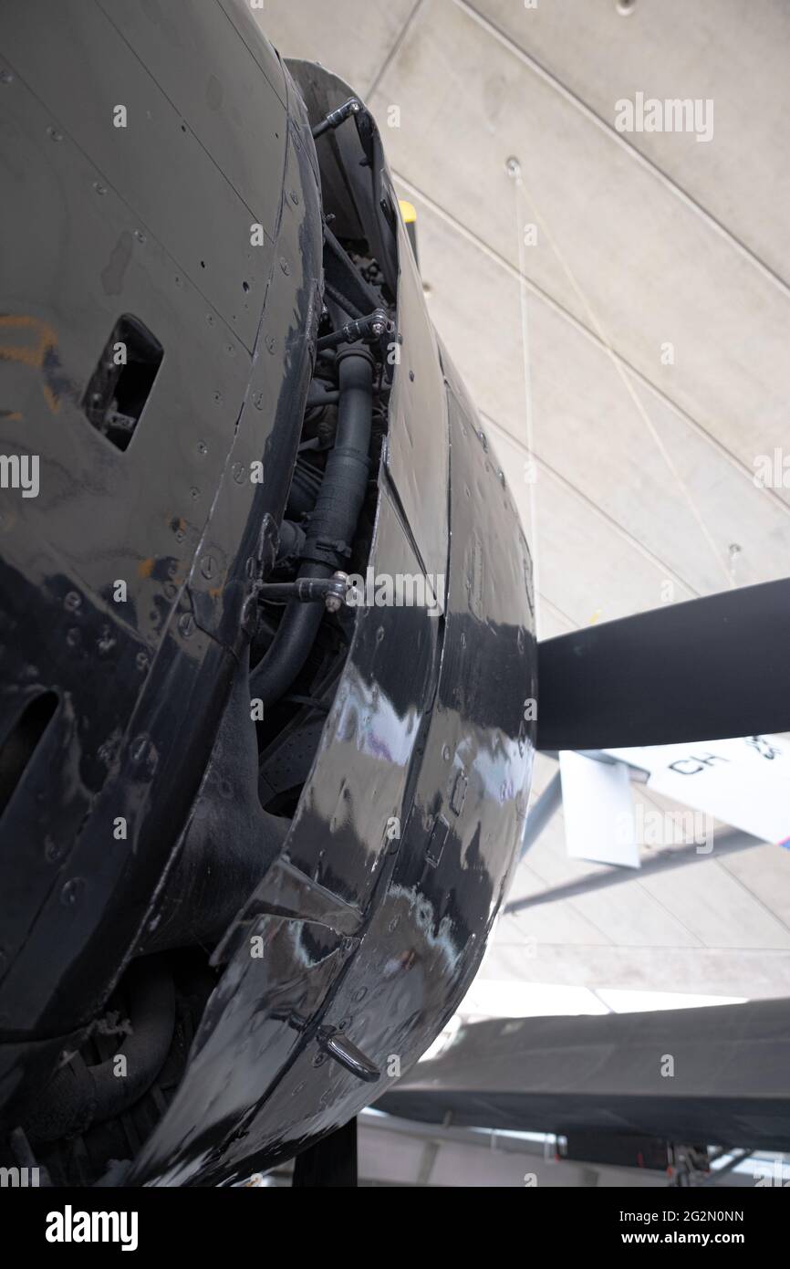 Vertical shot of an old airplane engine, side view of the cooling ...