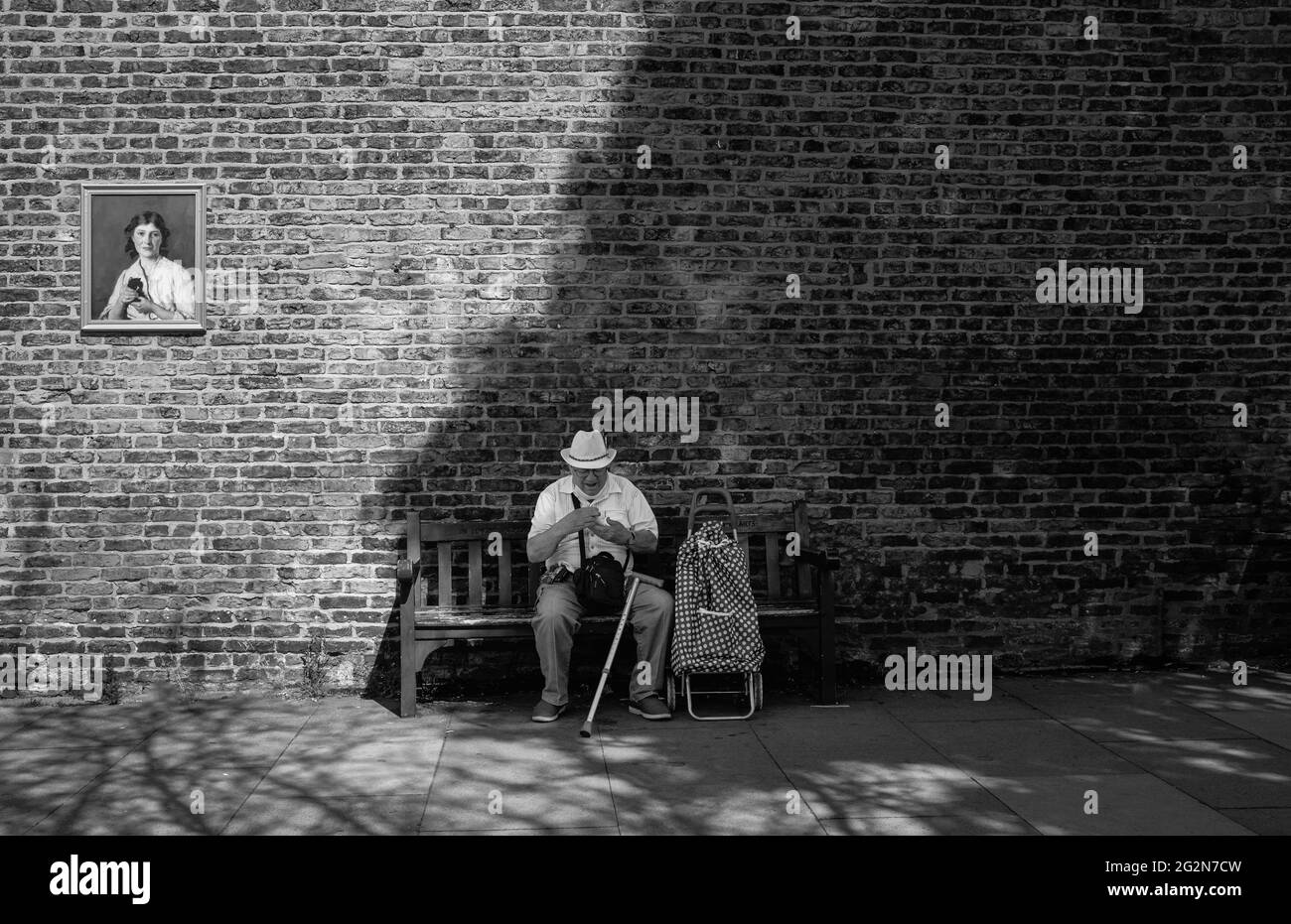 On the cell phone outdoors Black and White Stock Photos & Images - Alamy