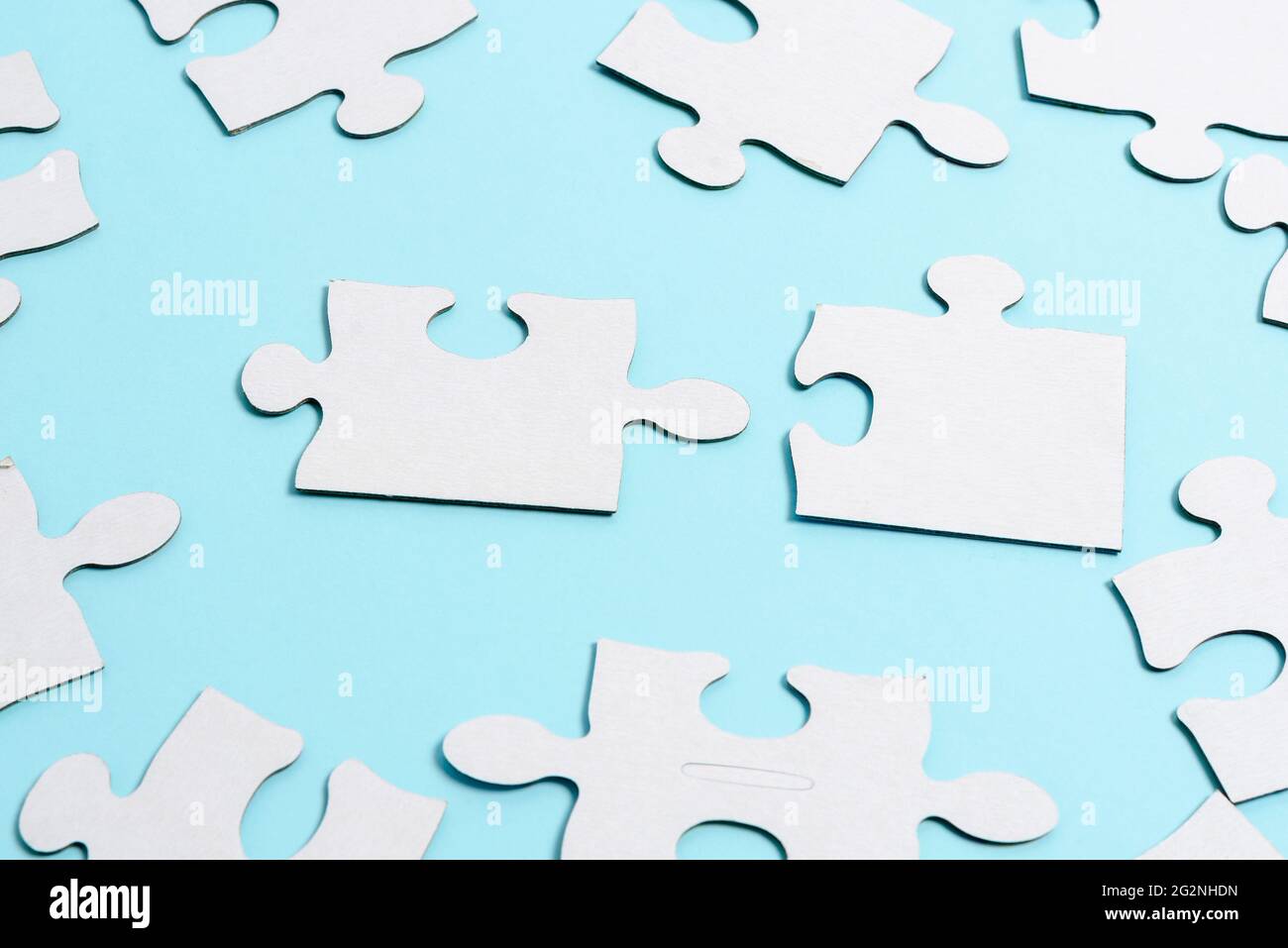 Building An Unfinished White Jigsaw Pattern Puzzle With Missing Last ...