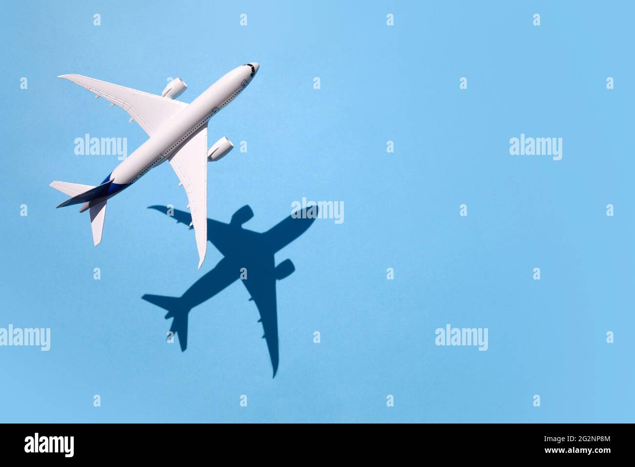 Model plane, airplane on sky blue background with deep shadow Stock ...