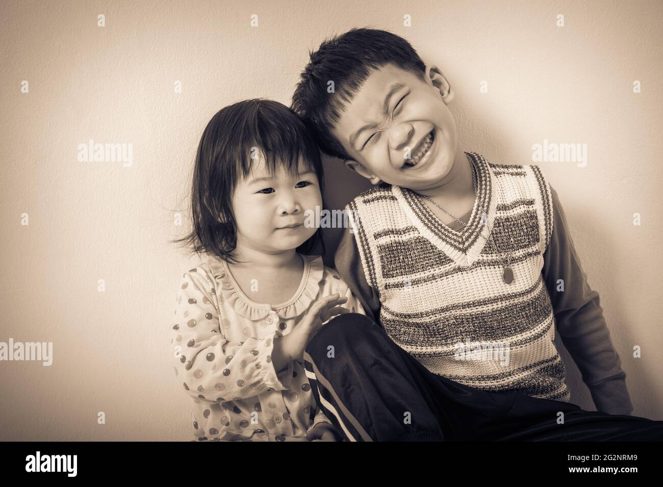 Little asian (thai) children happily, brother and sister smiling ...
