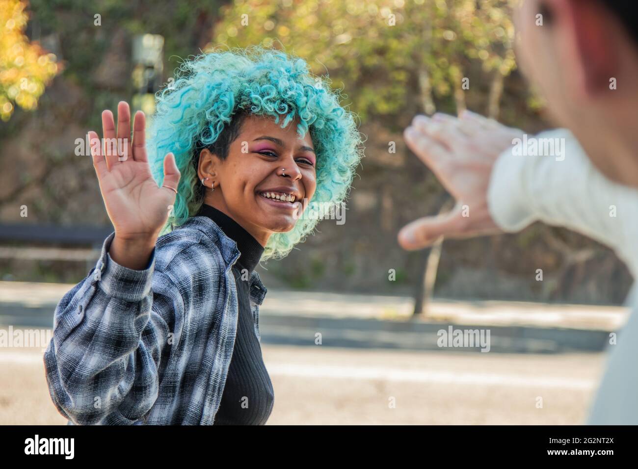 Friends Waving Goodbye High Resolution Stock Photography and Images - Alamy