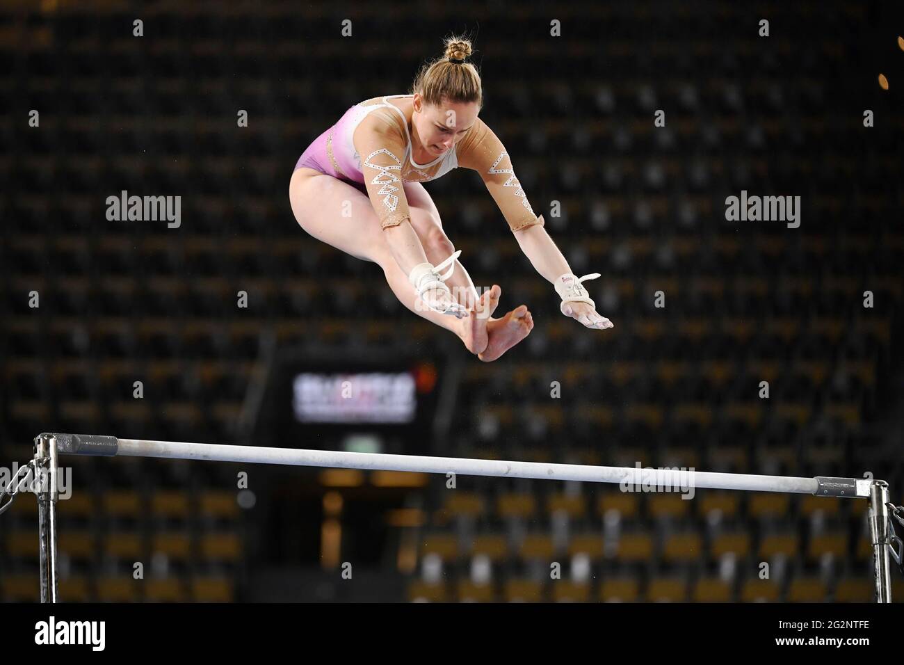 Munich, Germany. 12th June, 2021. Sarah VOSS (GER), action, uneven bars ...