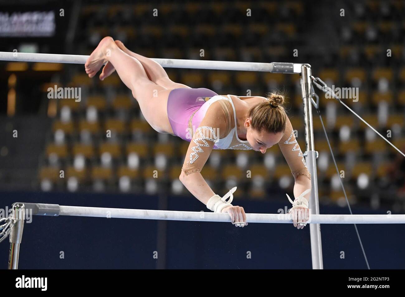 Munich, Germany. 12th June, 2021. Sarah VOSS (GER), action, uneven bars ...