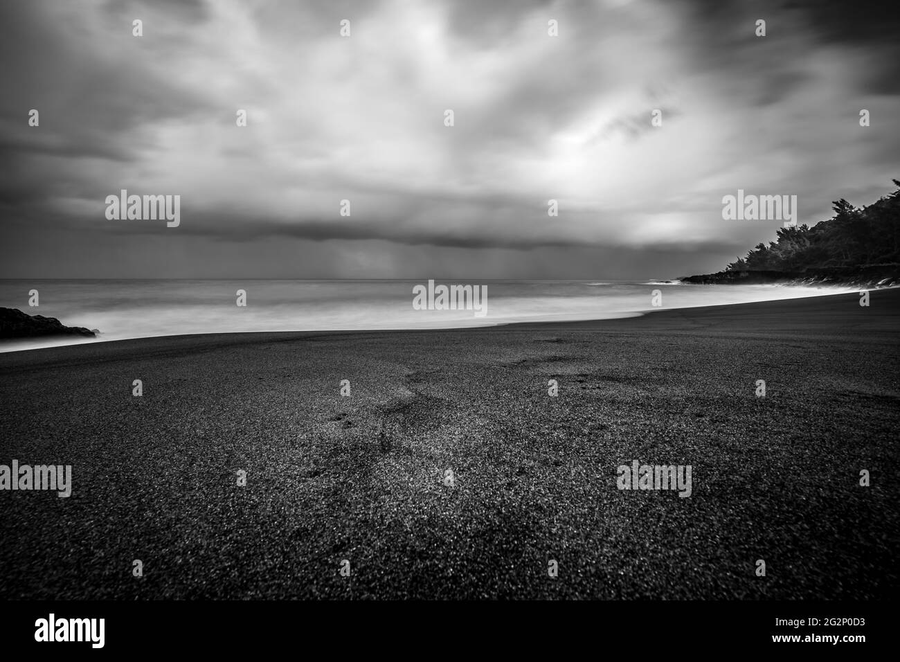 Lava sand beach Stock Photo - Alamy