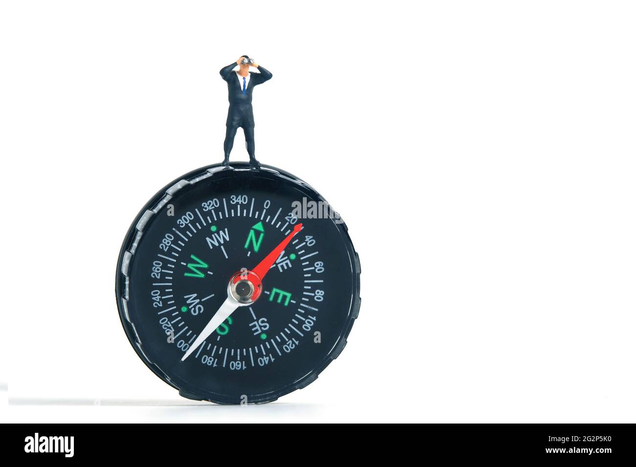 Man using compass on map Cut Out Stock Images & Pictures - Alamy