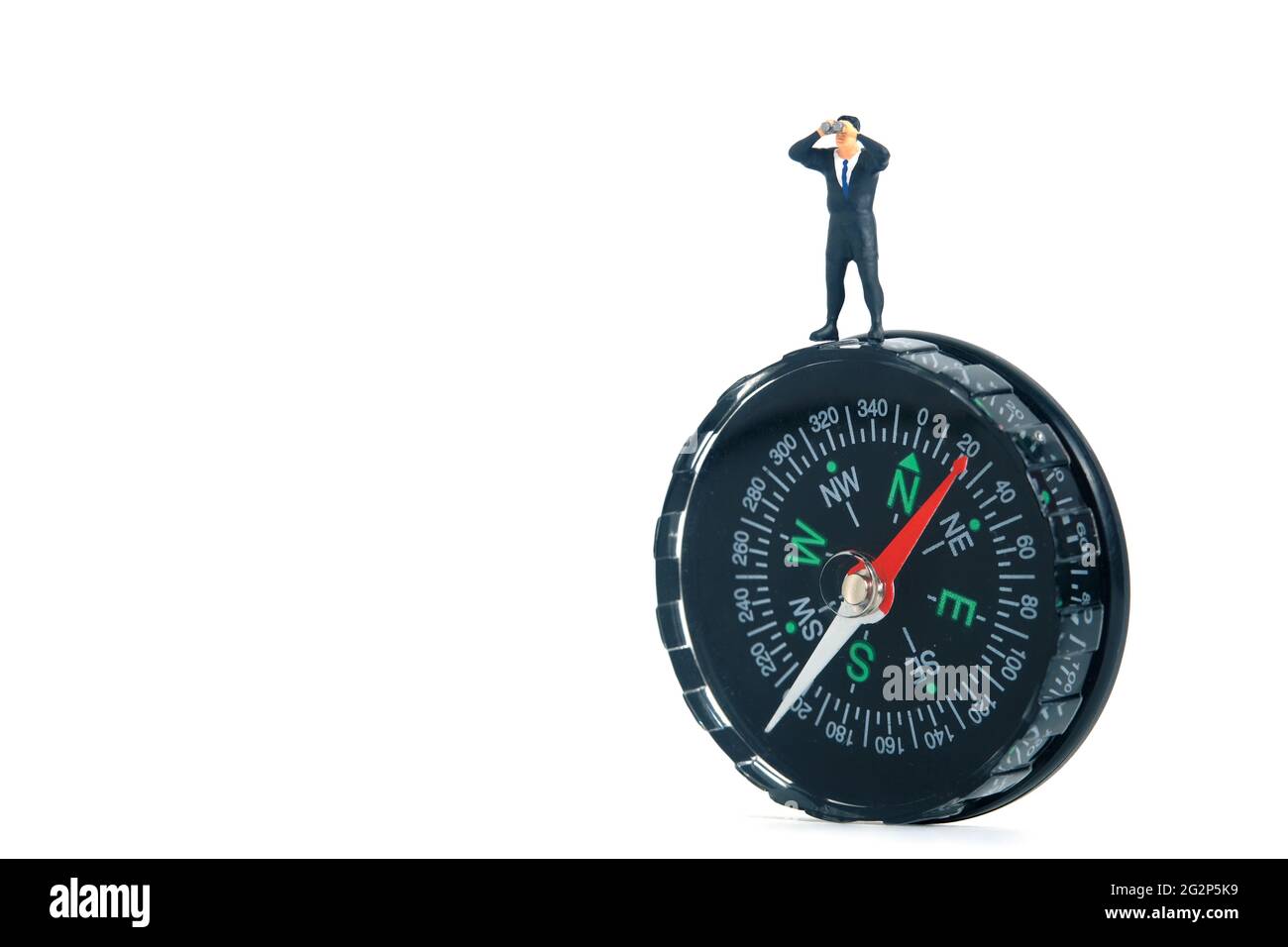 Man using compass on map hi-res stock photography and images - Alamy