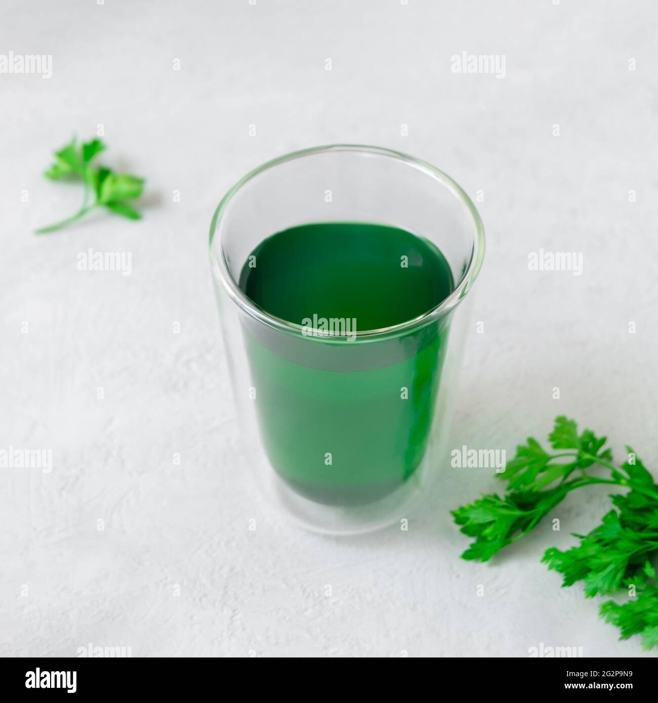 Healthy chlorophyll drink on concrete grey background Stock Photo - Alamy
