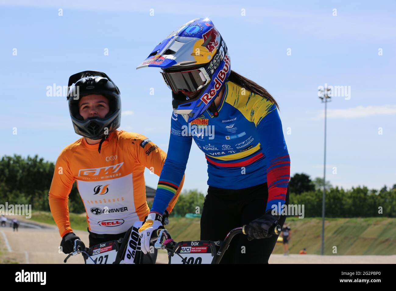 Fellow Colombian riders Andrea ESCOBAR YEPES (127) and two-times ...