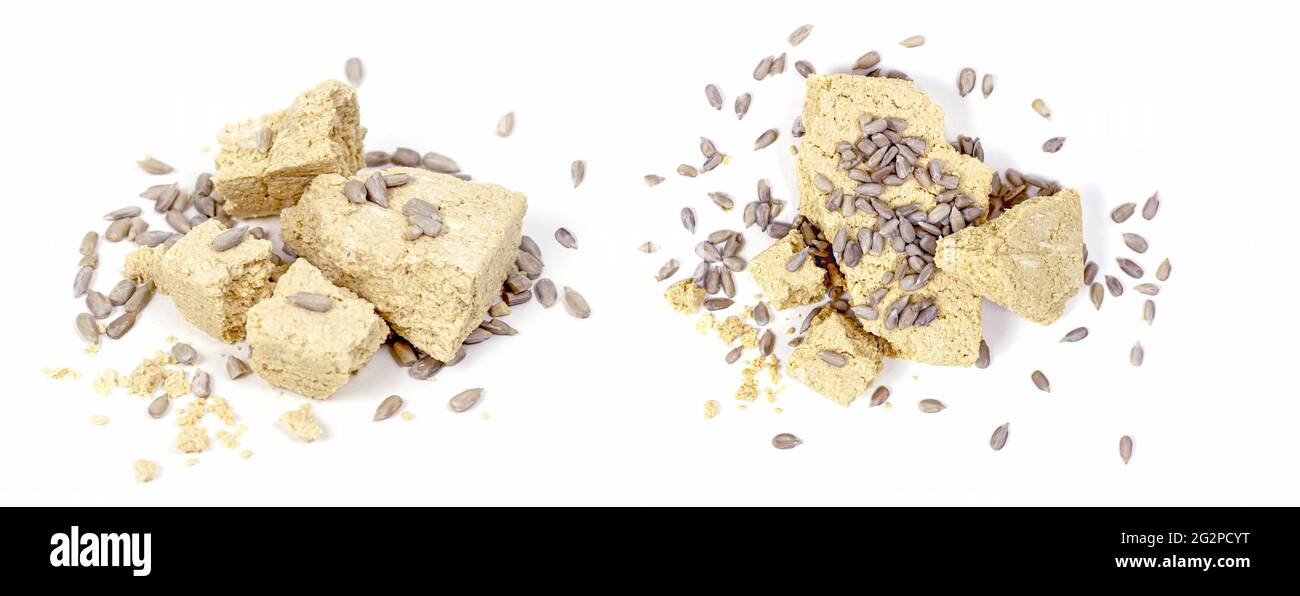 Traditional sweet turkish delight halva pieces with sunflower seeds set isolated on white ...