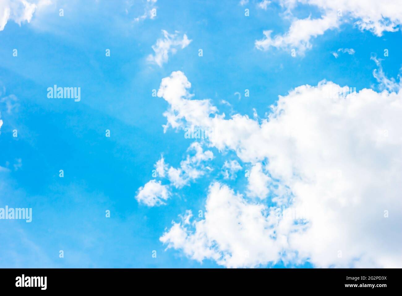 Simple beautiful gloomy blue sky with fluffy clouds in summer morning ...