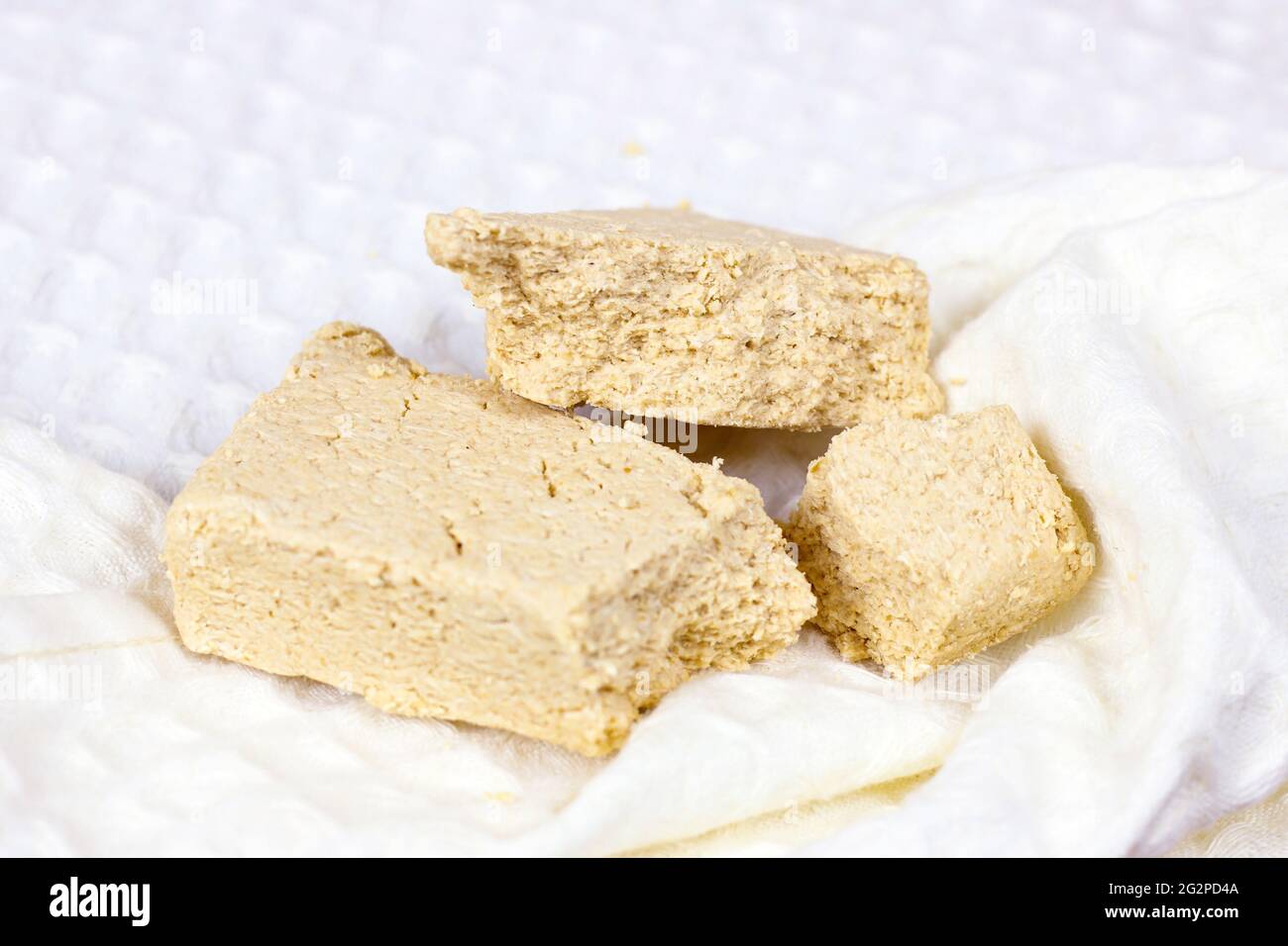 Traditional sweet turkish delight halva pieces on light background ...