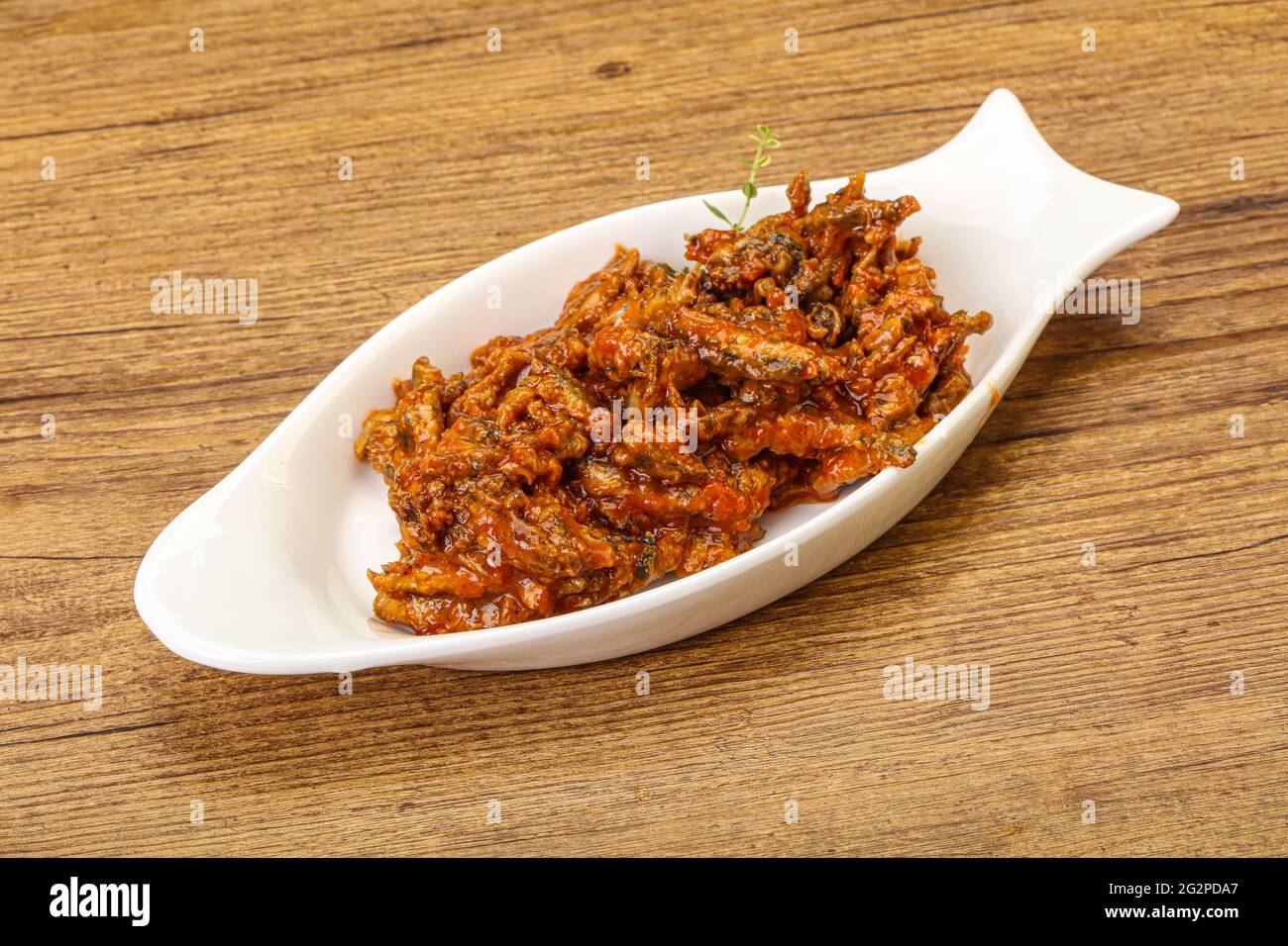 Canned anchovy snack in tomato sauce Stock Photo - Alamy