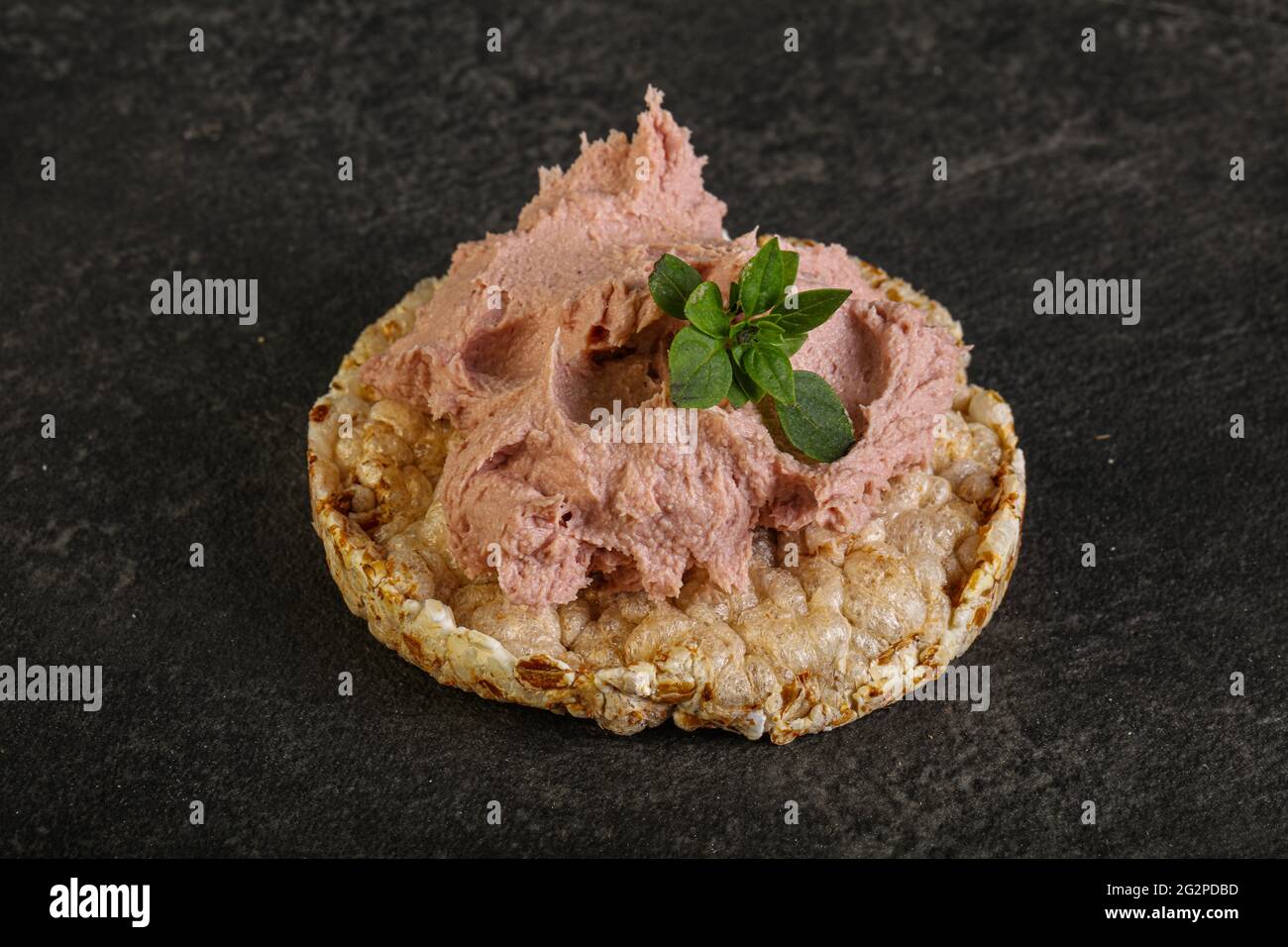 Liver pate in the bowl served basil leaves Stock Photo - Alamy