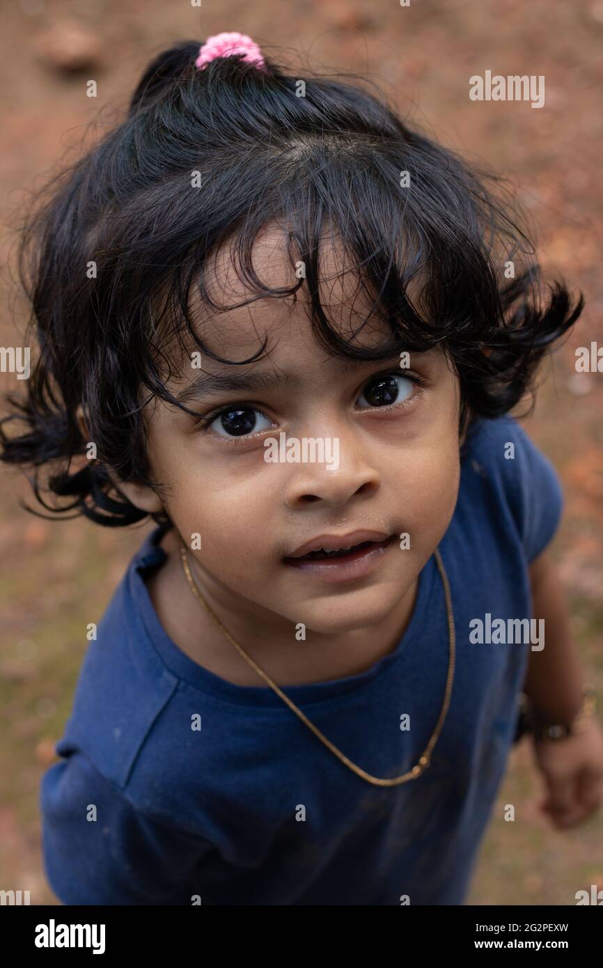 closeup of a cute little girl with a curious look on her face Stock ...