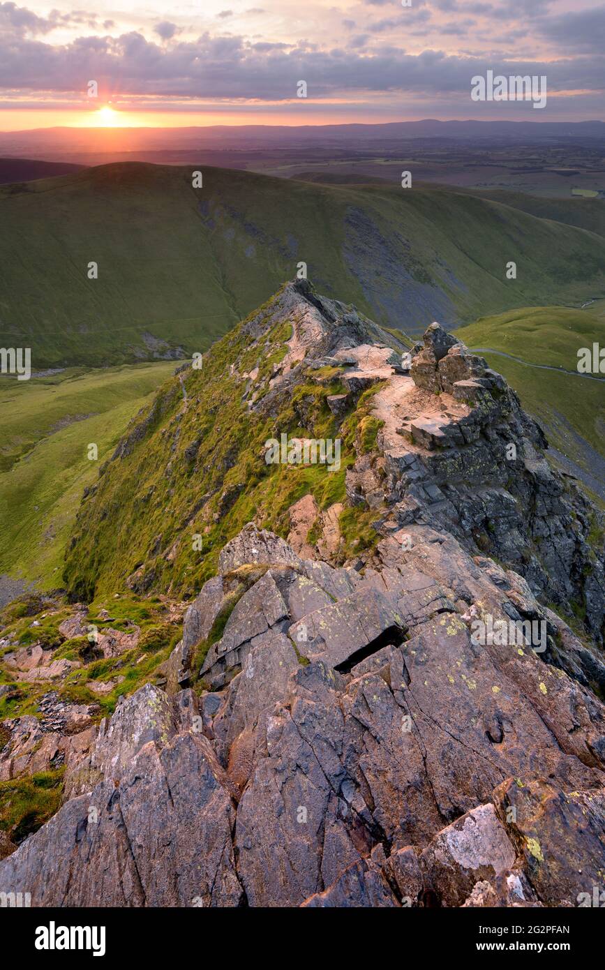 Summer sunrise overlooking Sharp Edge on Blencathra; a popular Lake ...