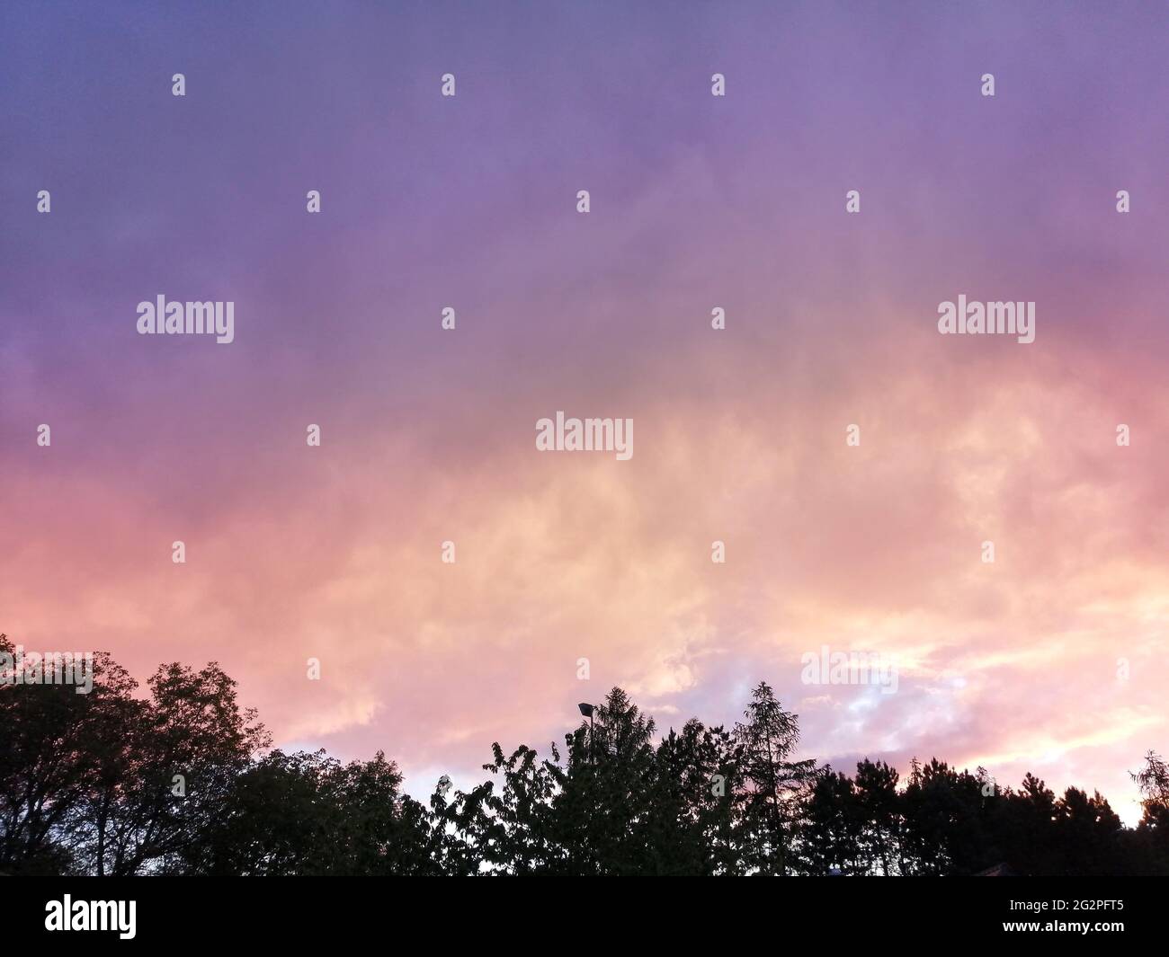Beautiful colorful purple, pink and yellow sunset sky view Stock Photo ...