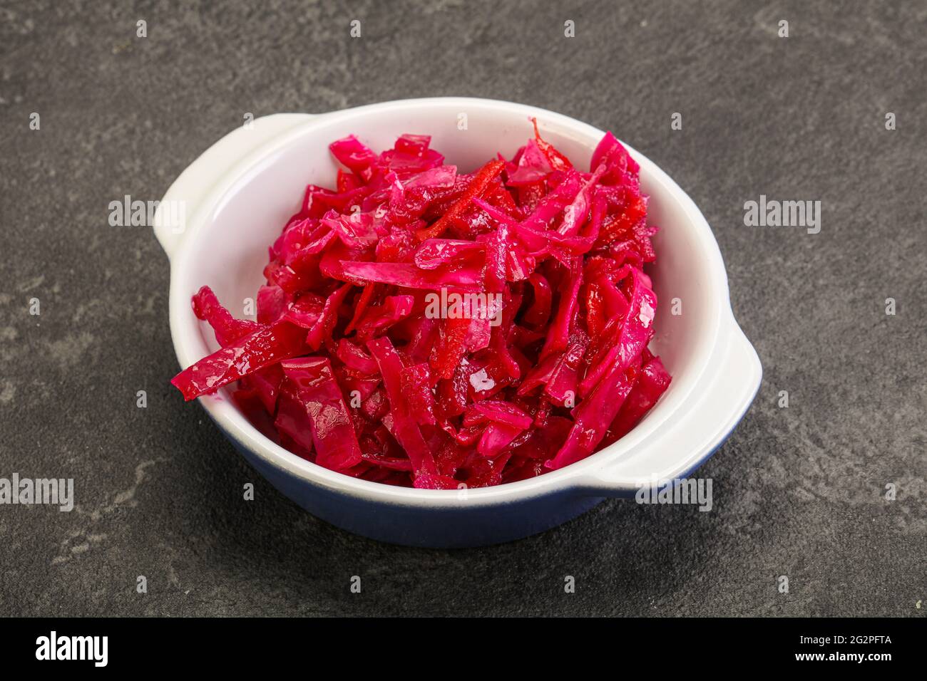Marinated red cabbage with beetroot in the bowl Stock Photo - Alamy