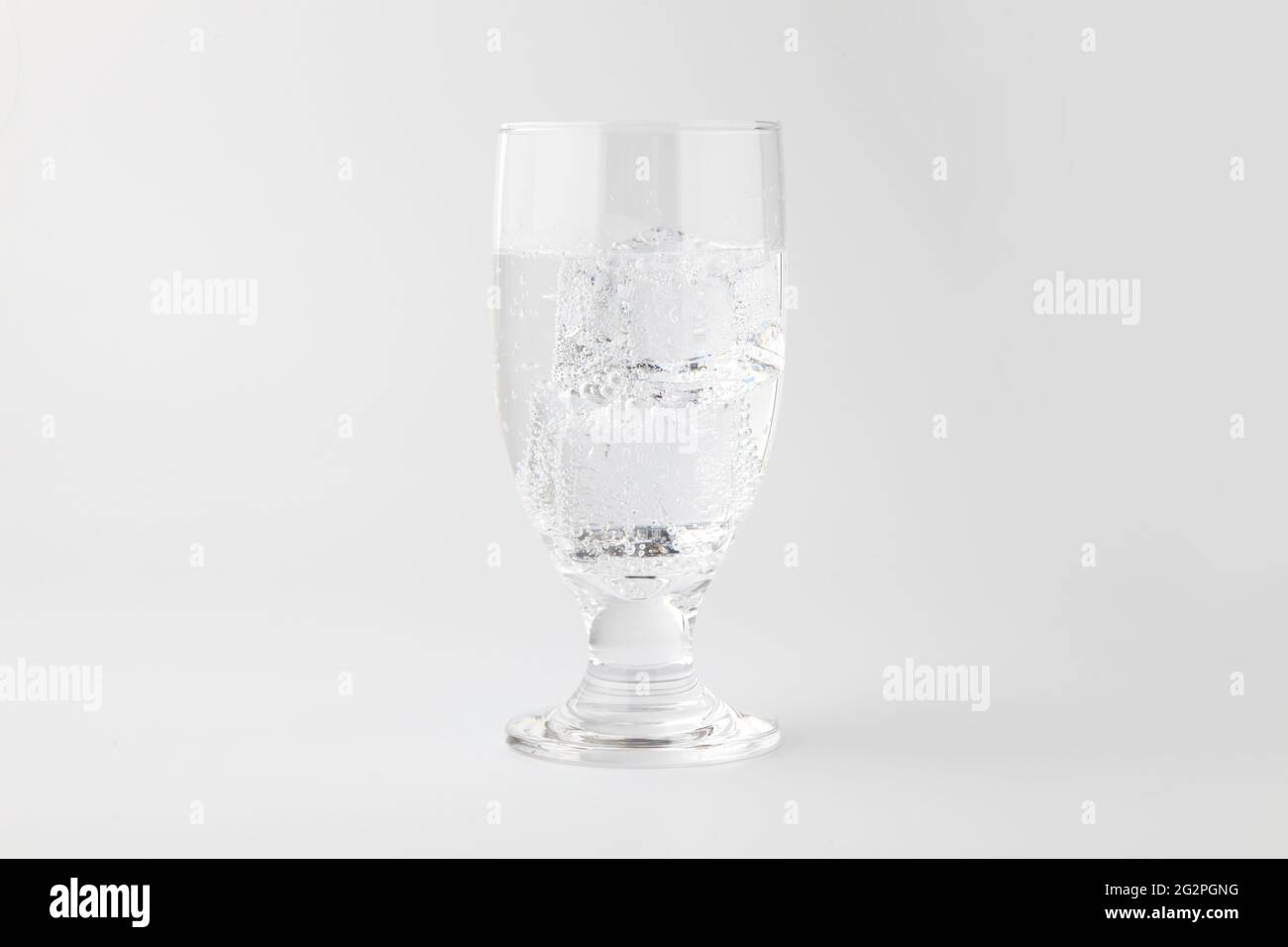 glass of cold carbonated water drink isolated on white background Stock Photo - Alamy