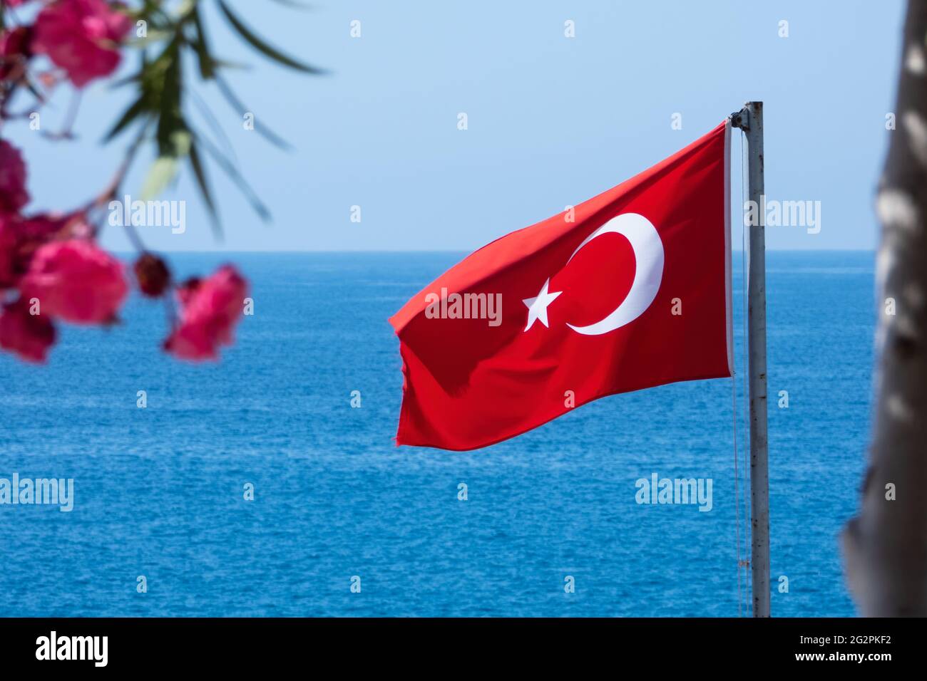 Turkish flag waving in the wind on a bright sunny day Stock Photo - Alamy