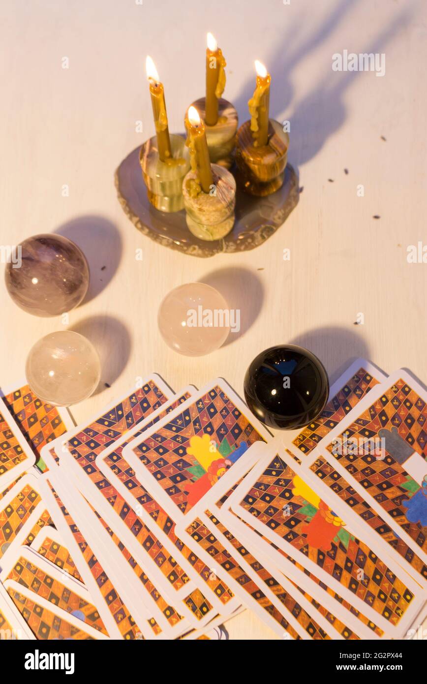 Tarot Setup Background. Tarot cards, candles, magic balls made of ...