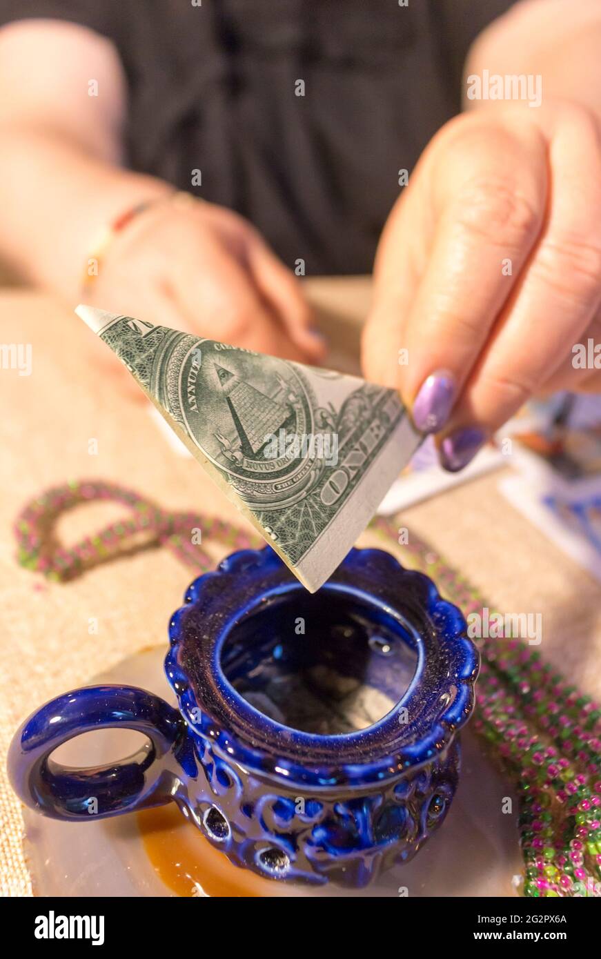 A magical ritual to attract money. Esoteric concept Stock Photo - Alamy
