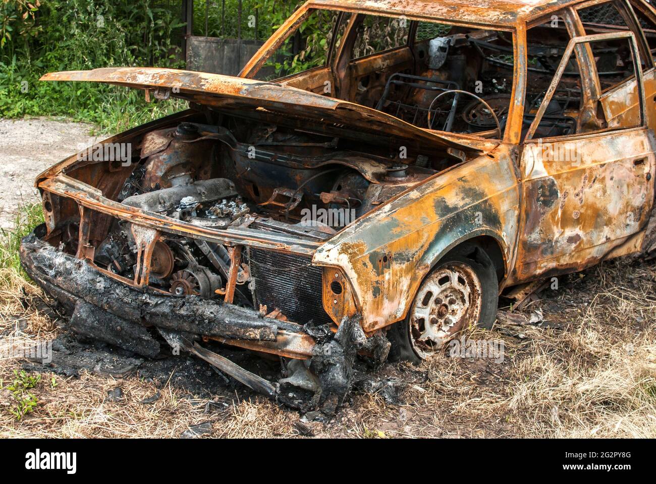 Body of exploded and burned abandoned car closeup Stock Photo - Alamy