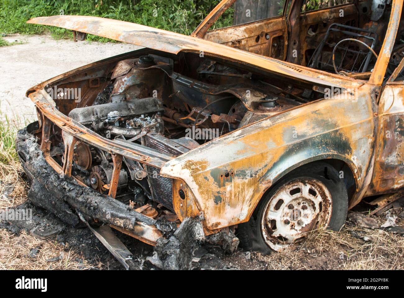 Body of exploded and burned abandoned car closeup Stock Photo - Alamy