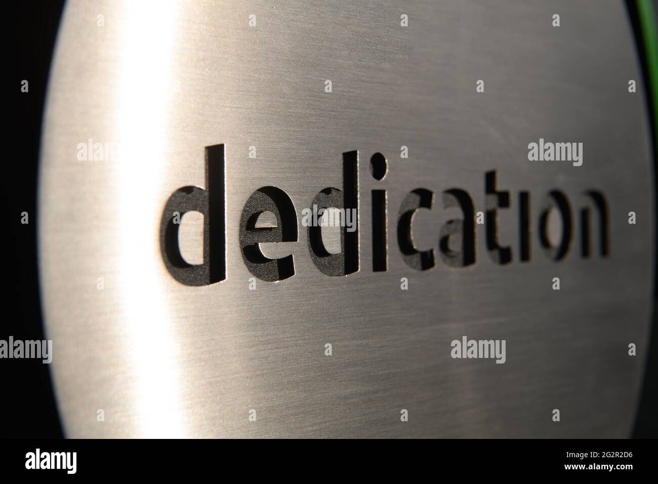 engraving a cnc machine on a piece of metal. Engraving dedication text ...