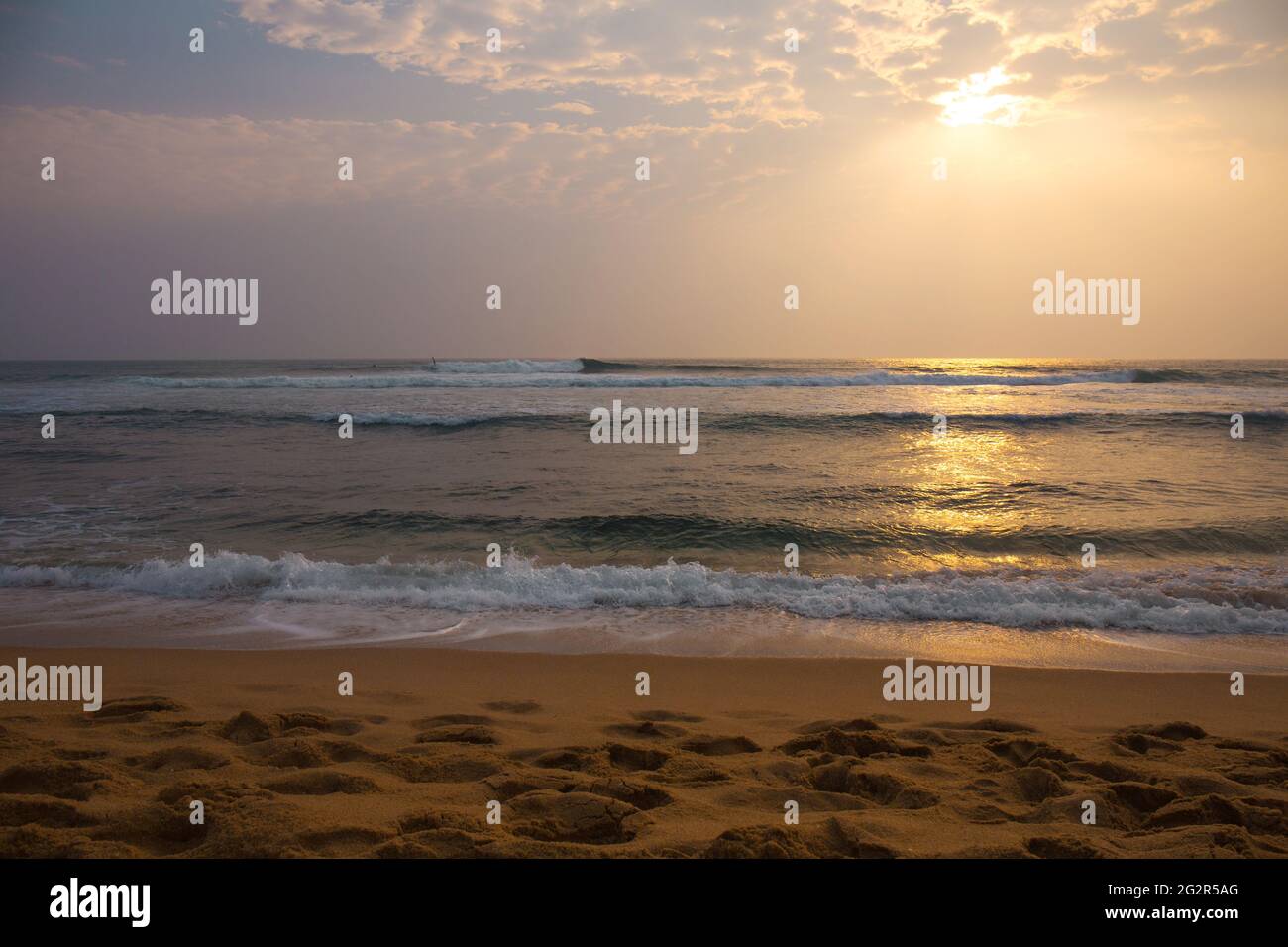 Beautiful pink sunset by the raging ocean, summer background Stock ...
