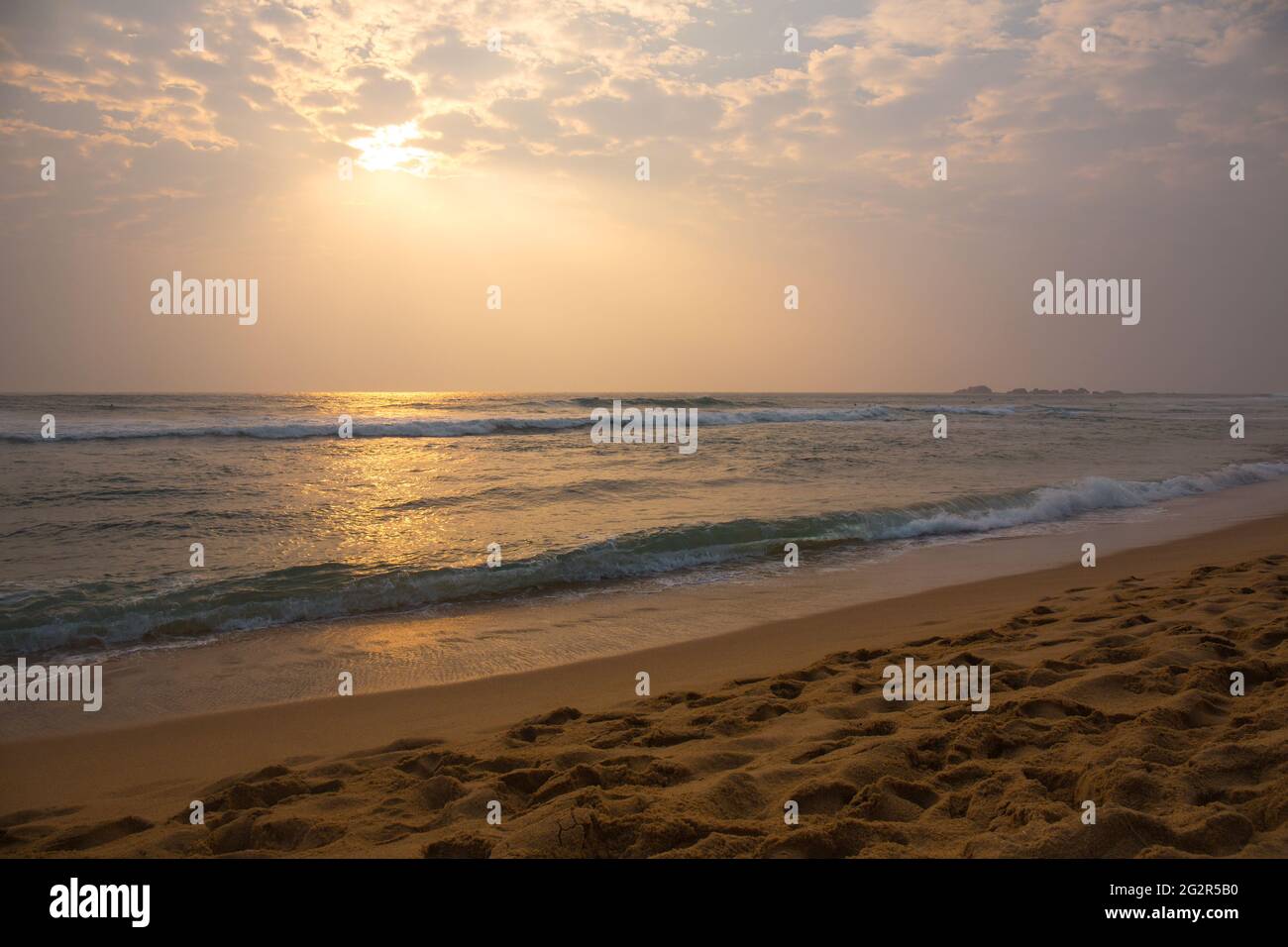 Beautiful pink sunset by the raging ocean, summer background Stock ...