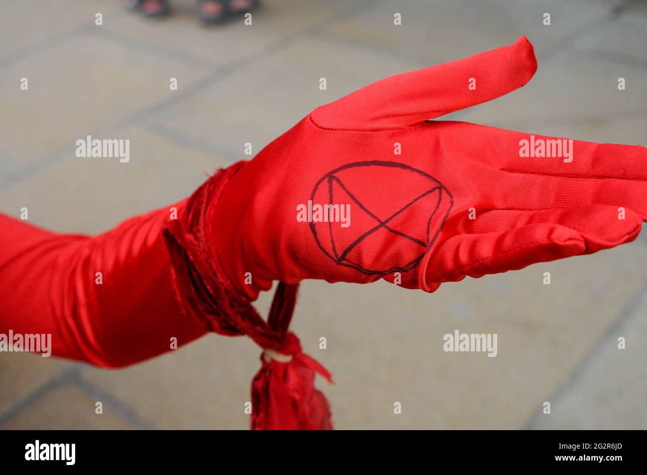 Cambridge, UK, England, 12-062021, Red gloved hand with XR hand drawn ...