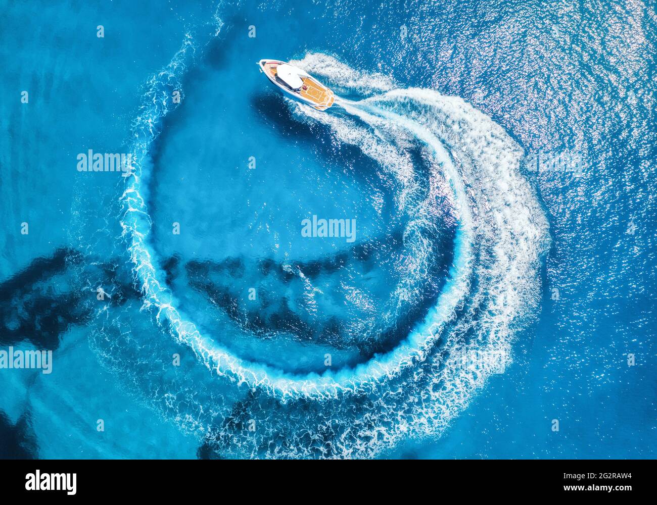 Aerial view of the speed boat in clear blue water at sunny day Stock ...