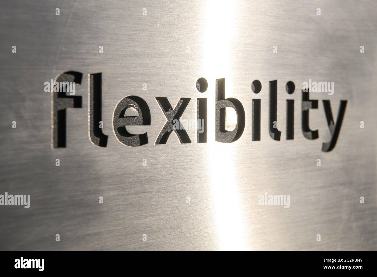 Engraving a cnc machine on a piece of metal. Engraving flexibility text ...