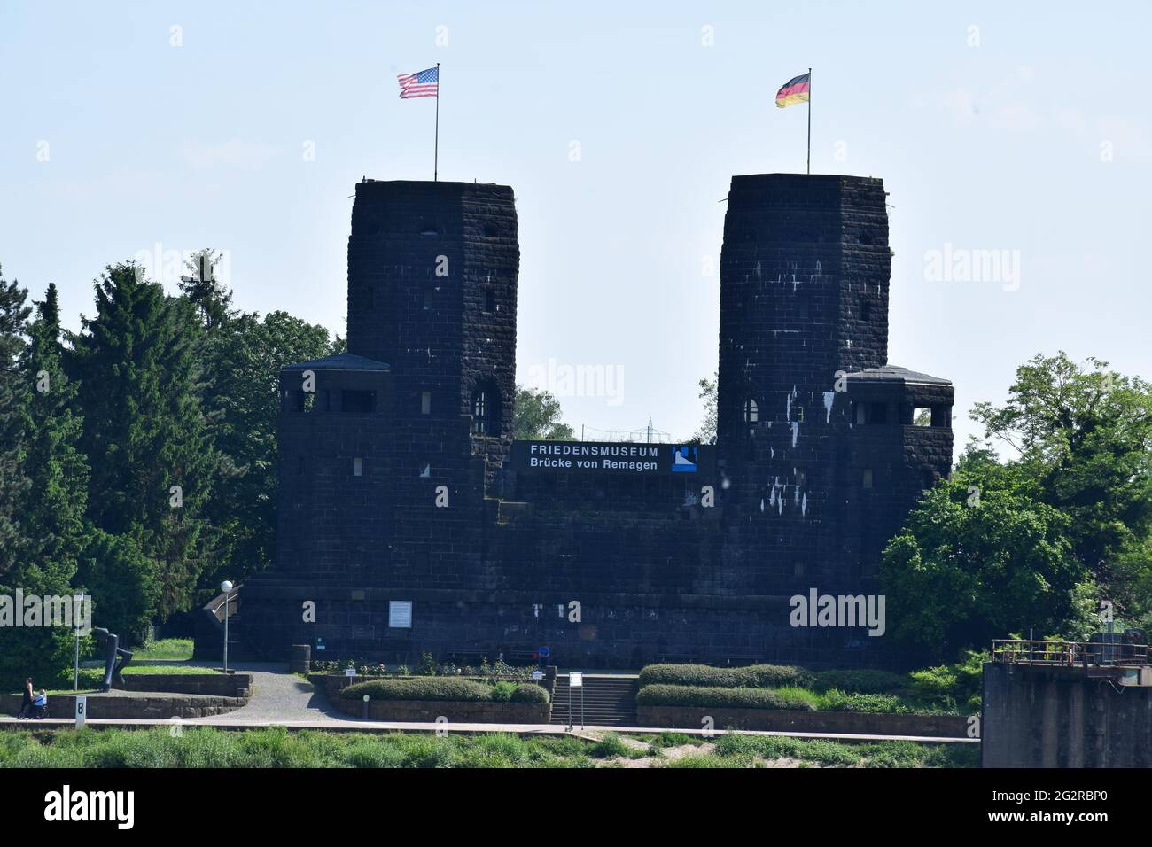 West towers of the bridge of Remagen with the remains of the war bridge ...