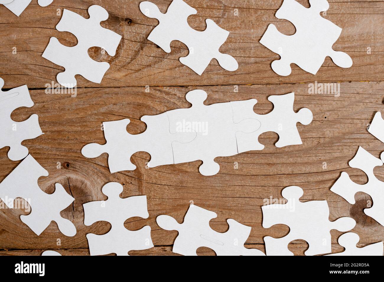 Building An Unfinished White Jigsaw Pattern Puzzle With Missing Last ...