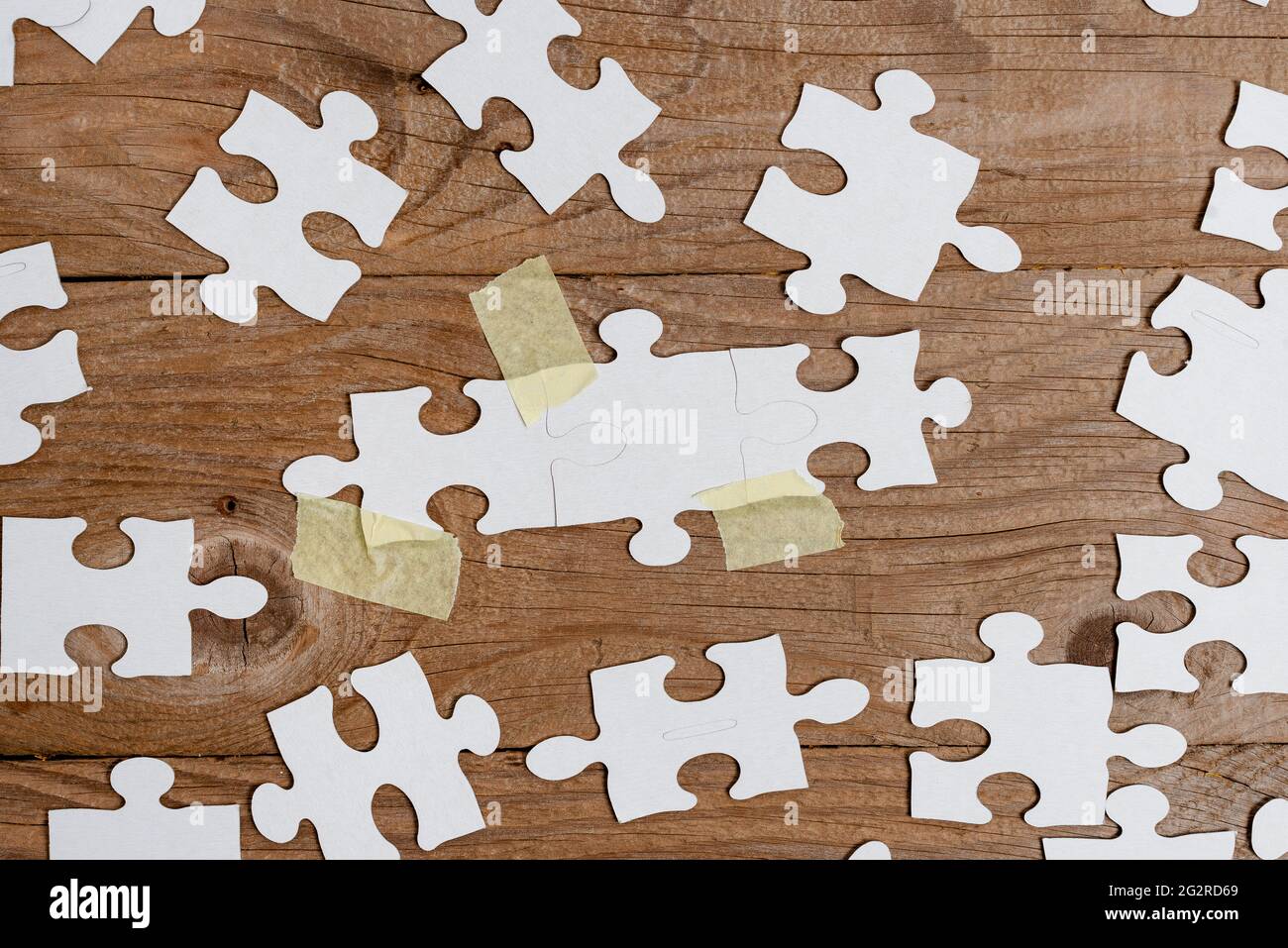 Building An Unfinished White Jigsaw Pattern Puzzle With Missing Last ...