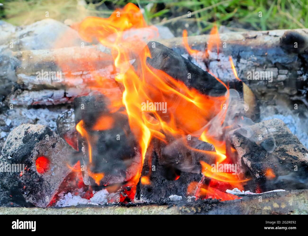 Bonfire is burning, hot coals for barbecue Stock Photo - Alamy