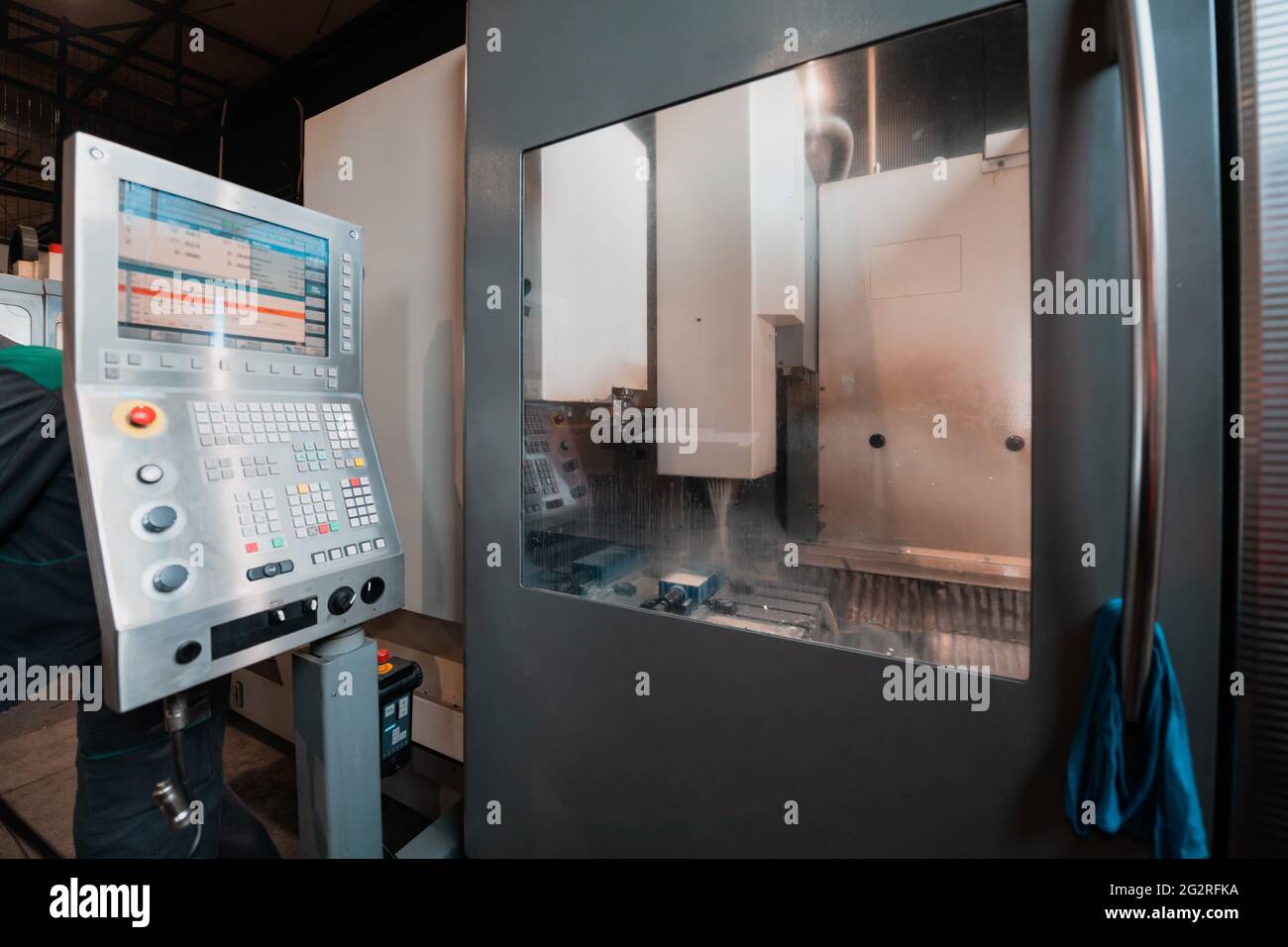 machine control panel CNC with the image of the details on the screen ...